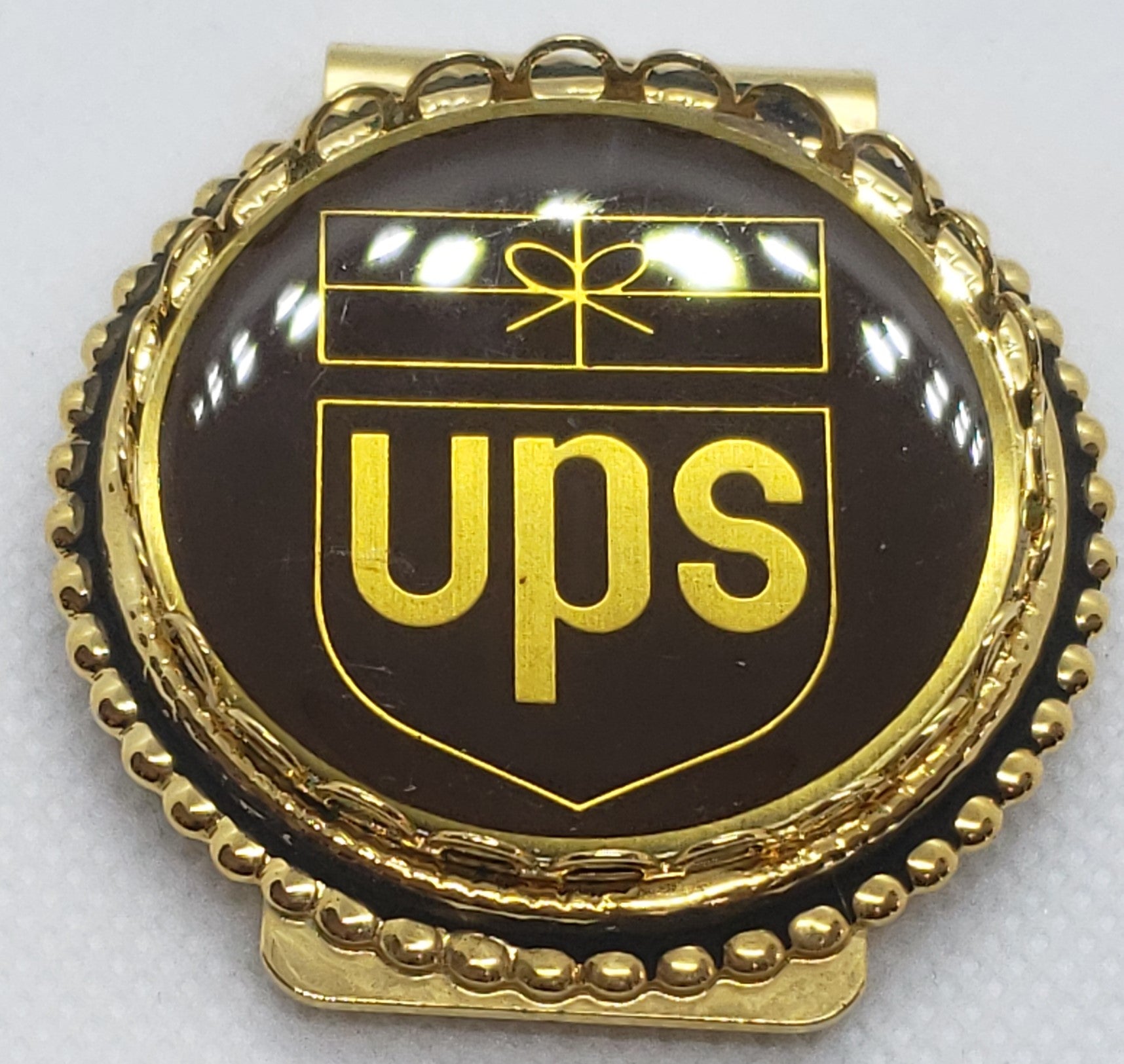 Gold Tone Lace Mount Setting of a UPS Logo Money Clip – R&R Humble ...